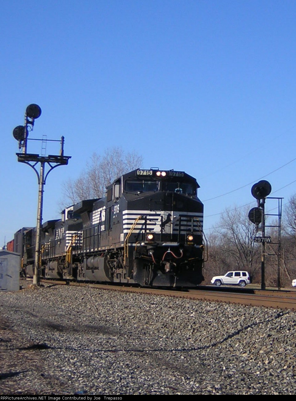 NS 9715 takes a train east